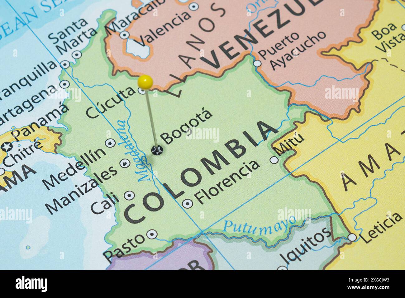 Close up to a Bogota city with a Yellow pin needle into Colombia ...