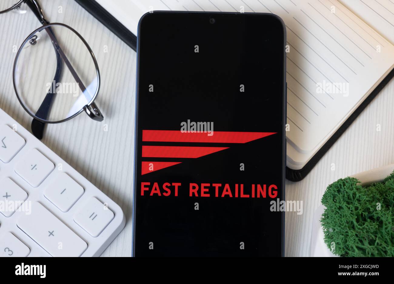 New York, USA - 11 June 2024: Fast Retailing Logo on Phone Screen ...