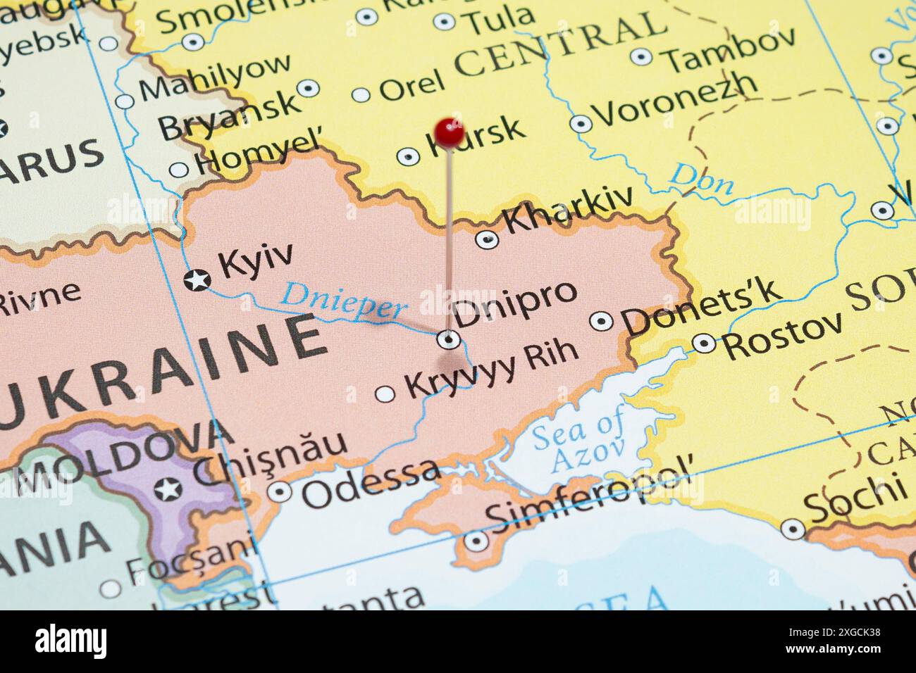 Close up to a Dnipro city with a red pin needle into Ukraine country ...