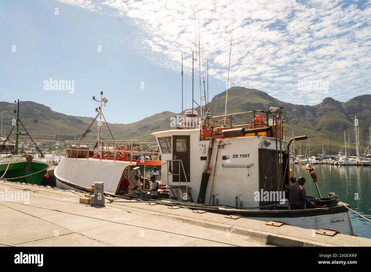 fishing boat in Hout Bay harbour with African men or crew onboard ...