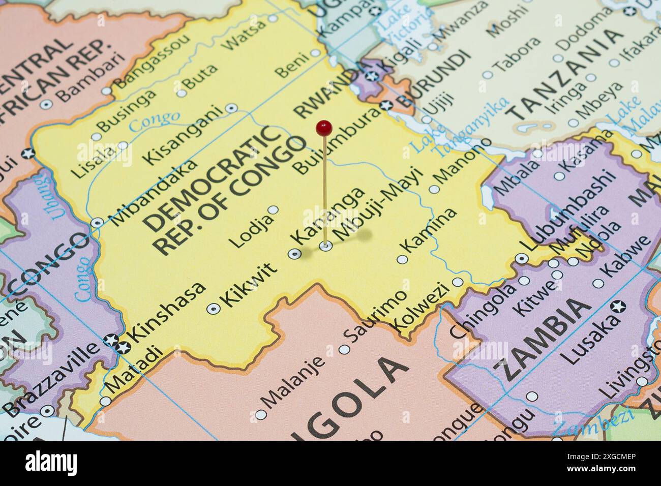 Close up to a Mbuji Mayi city with a red pin needle into Democratic ...