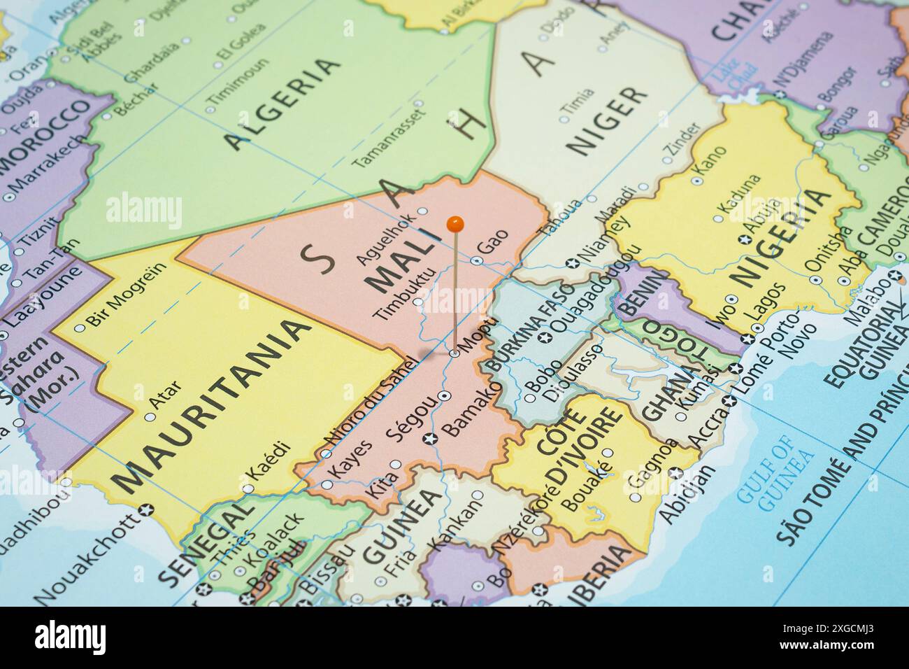 Close up to a Mopti city with an orange pin needle into Mali country ...