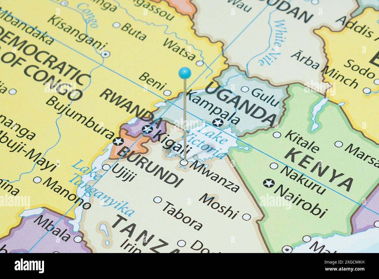 Close up to a Mwanza city with a light blue pin needle into Tanzania ...
