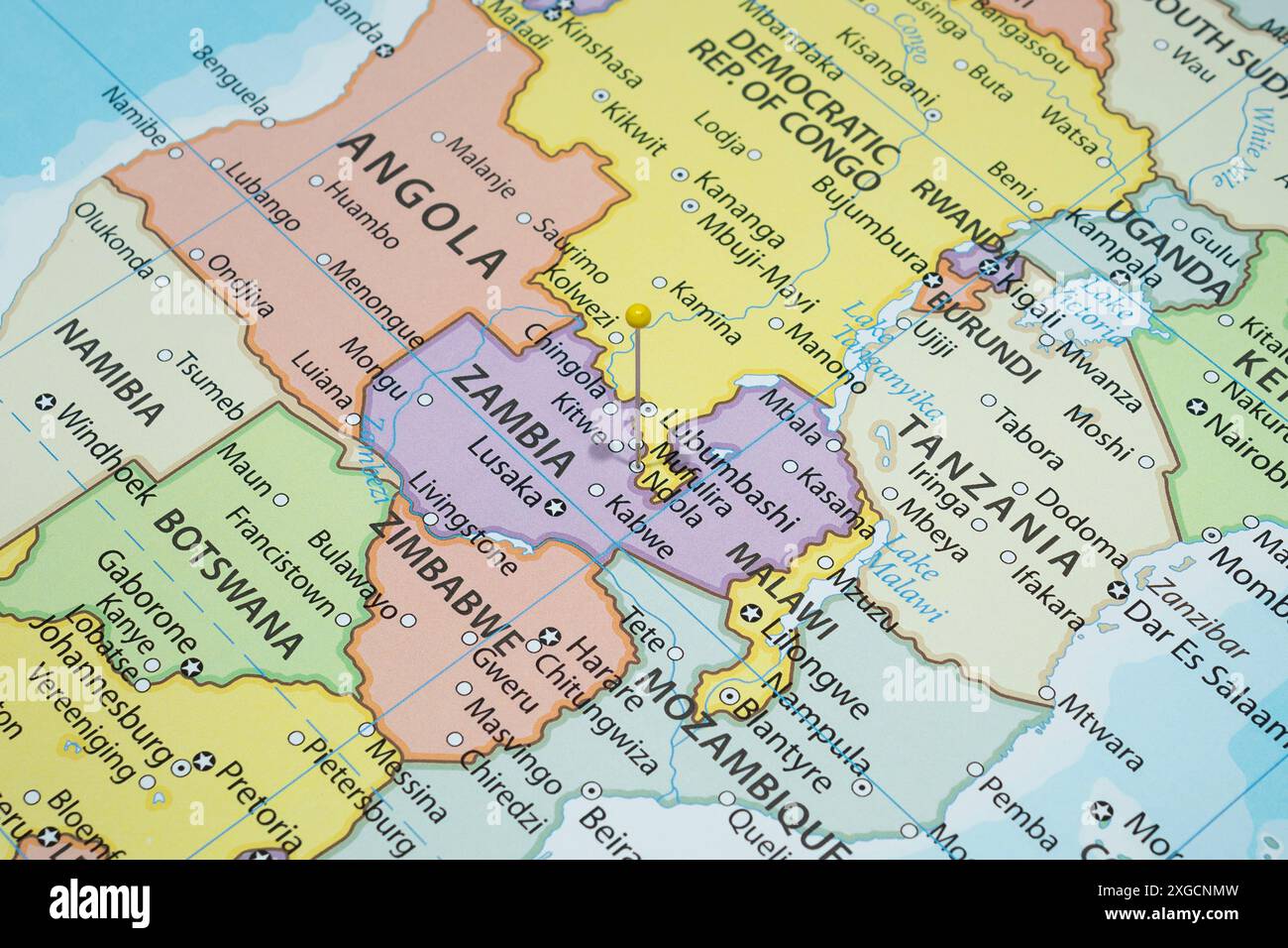 Close up to a Ndola city with a yellow pin needle into Zambia country ...