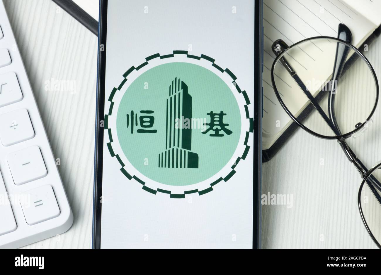New York, USA - 21 June 2024: Henderson Land Development Logo on Phone ...