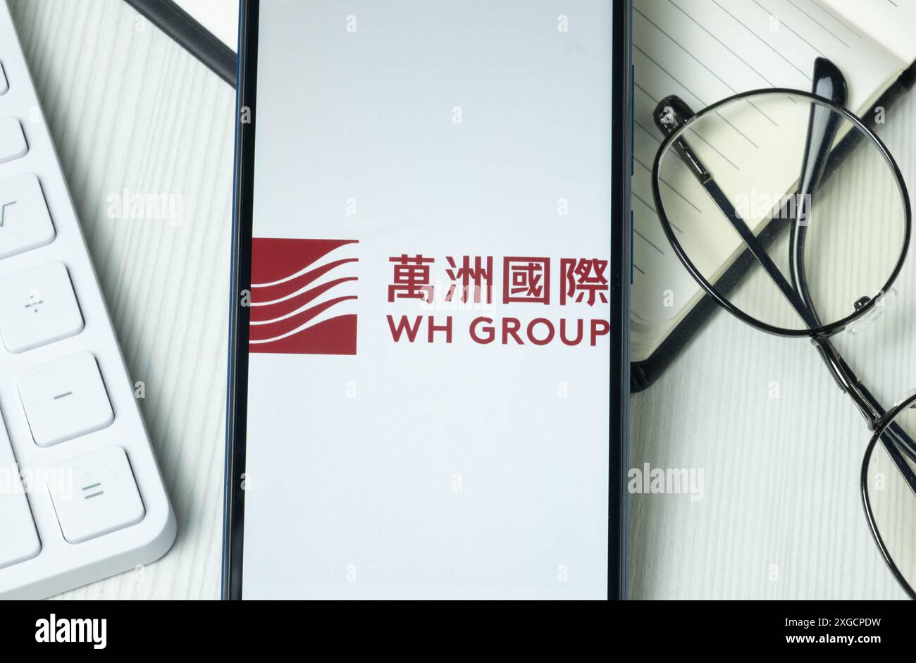 New York, USA - 21 June 2024: WH Group Logo on Phone Screen, Company ...