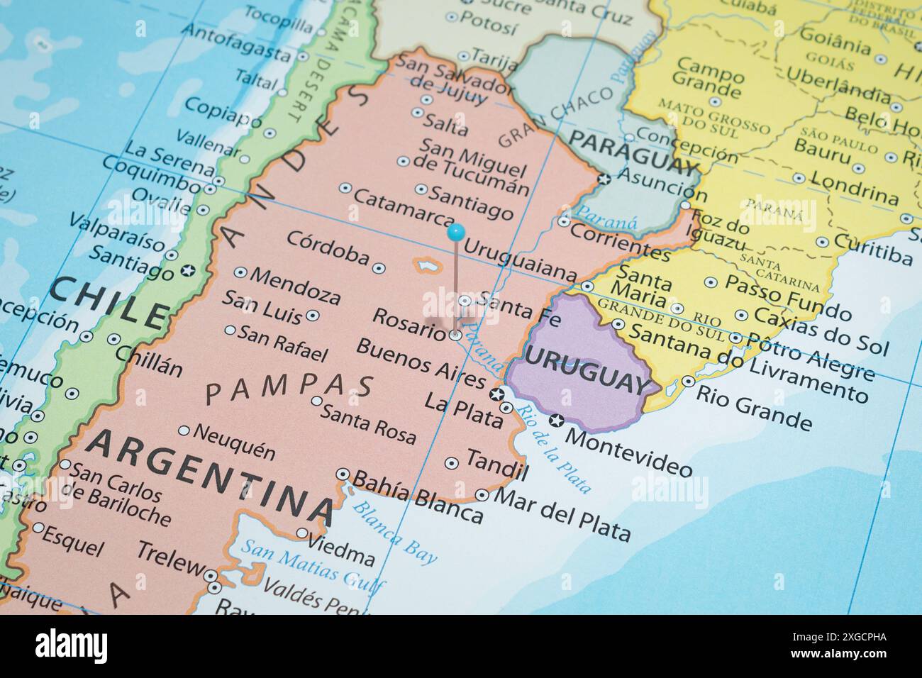 Close up to a Rosario city with a light blue pin needle into Argentina ...