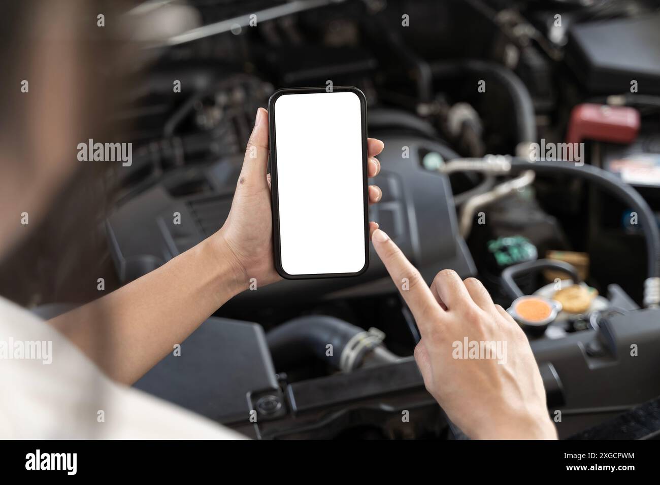Close-up of woman's hands holding smartphone with empty space on screen ...