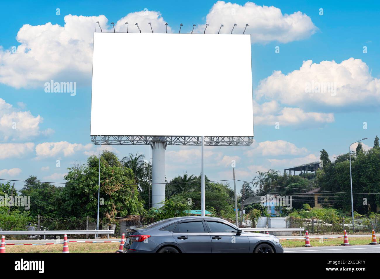 In summer, blue sky, highway and billboard. Outstanding advertising ...