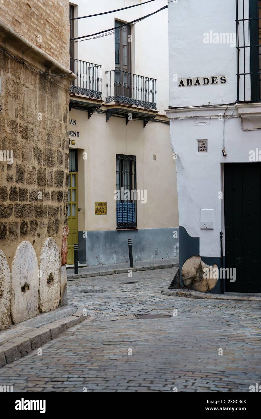 Seville, Spain. February 7, 2024 - Empty cobblestone street corner with ...