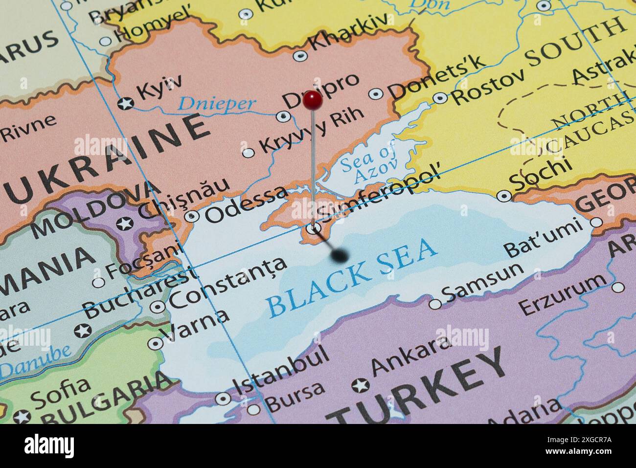 Close up to a Simferopol city with a red pin needle into Ukraine ...