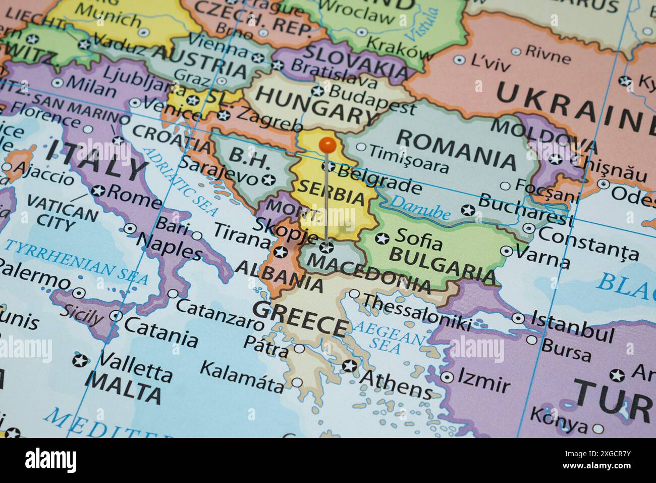 Close up to a Skopje city with an orange pin needle into North ...