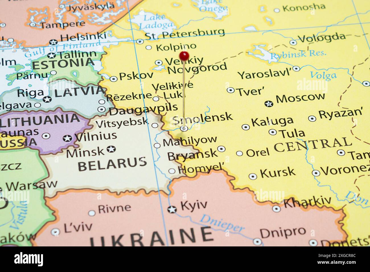 Close up to a Smolensk city with a red pin needle into Russia country ...