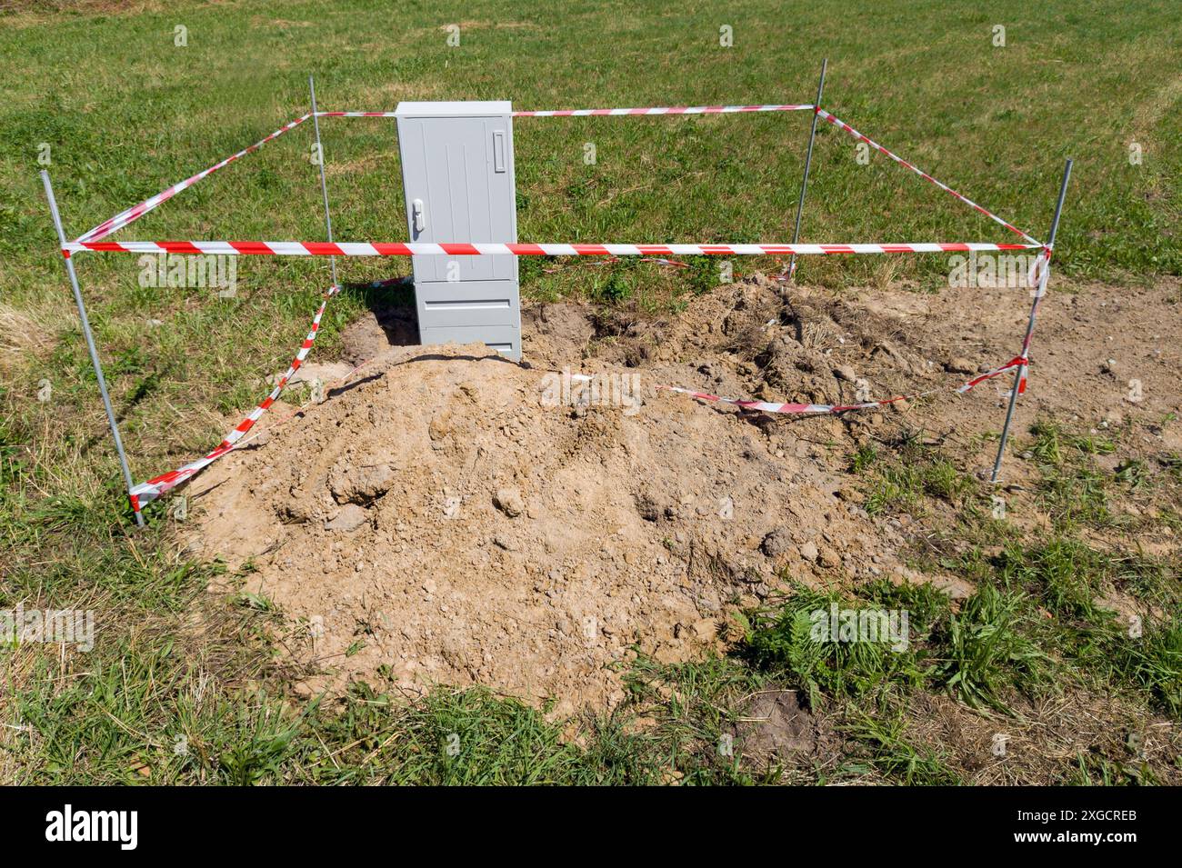 Yellow Skip Bin with Cardboard Waste Stock Photo - Alamy