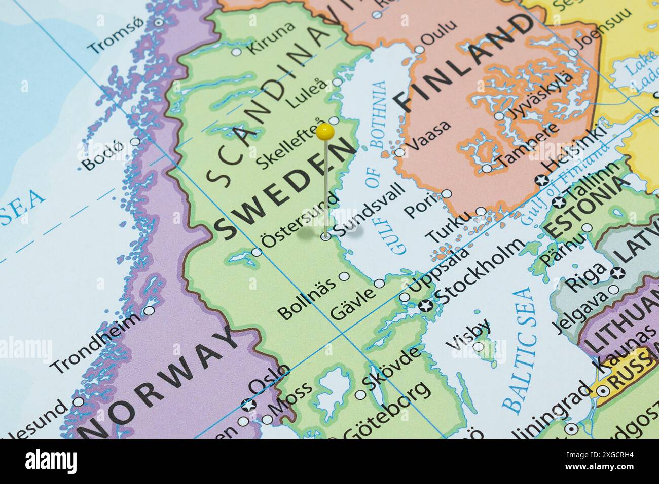 Close up to a Sundsvall city with a yellow pin needle into Sweden ...
