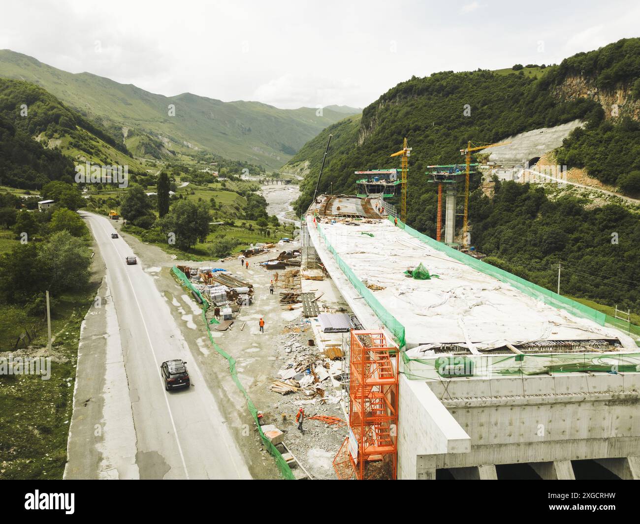 Kazbegi, Georgia - 7th july, 2024: aerial view cranes and bridge ...