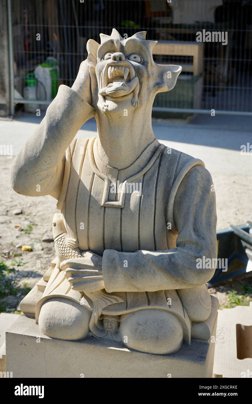 New carved stone gargoyle figure at York Minster Cathedral, with frog ...