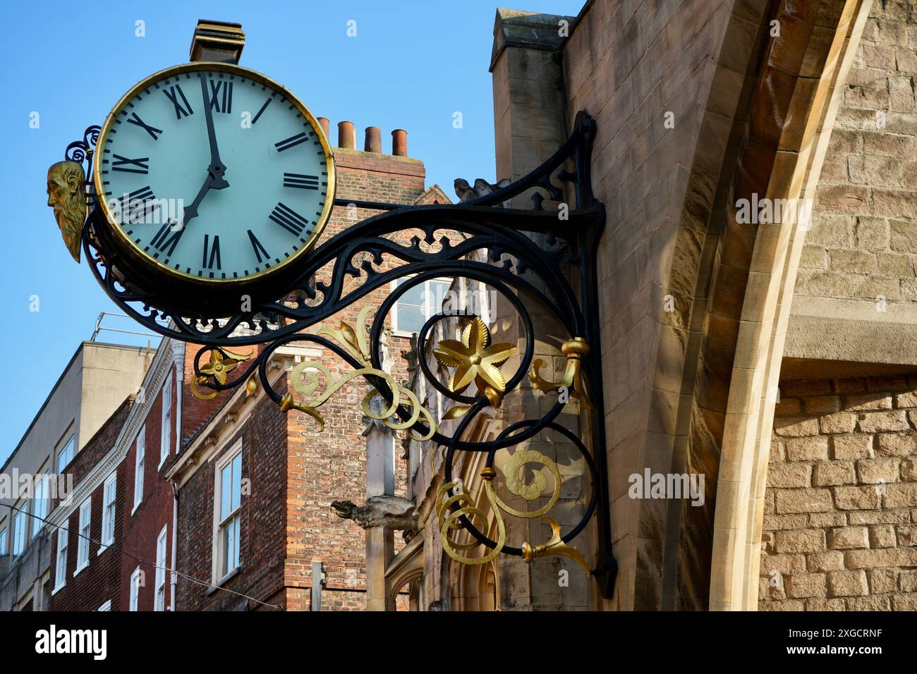Large ornate vintage clock in the city centre Stock Photo - Alamy