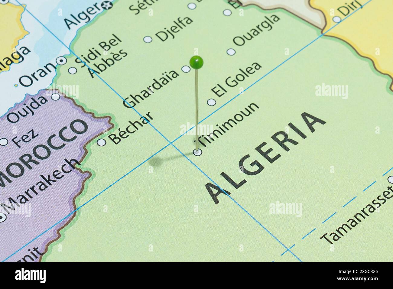 Close up to a Timimoun city with a green pin needle into Algeria ...