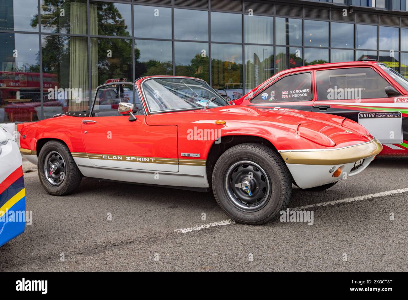 A 1970's Lotus Elan parked in an urban setting. British sports cars or ...