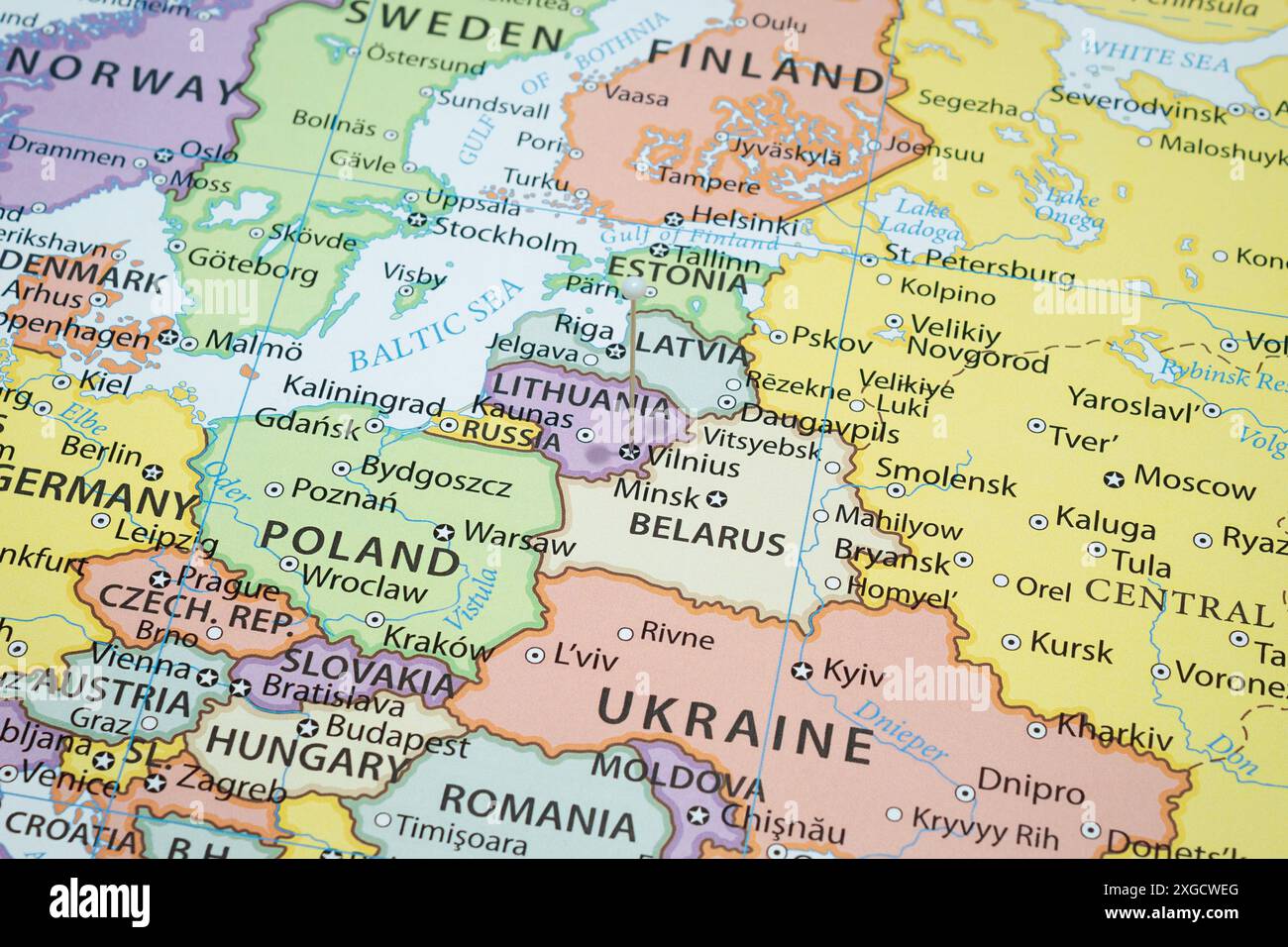 Close up to a Vilnius city with a white pin needle into Lithuania ...