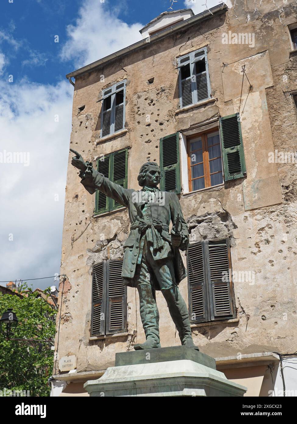 Statue of general Jean-Pierre Gaffory in front of a building with many ...