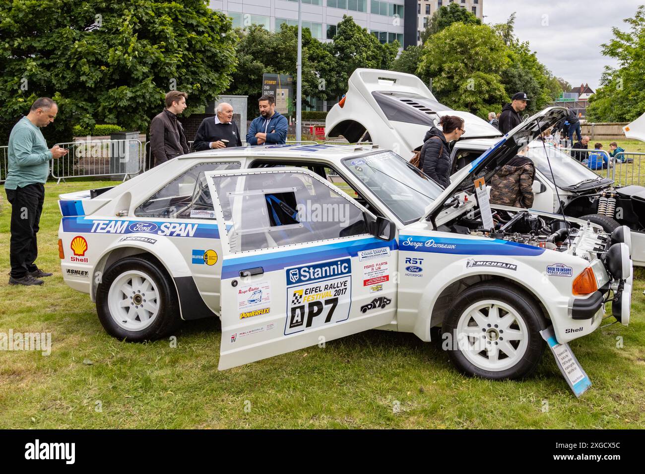 Car enthusiasts check out a Ford Escort MkIII rally car at Coventry ...