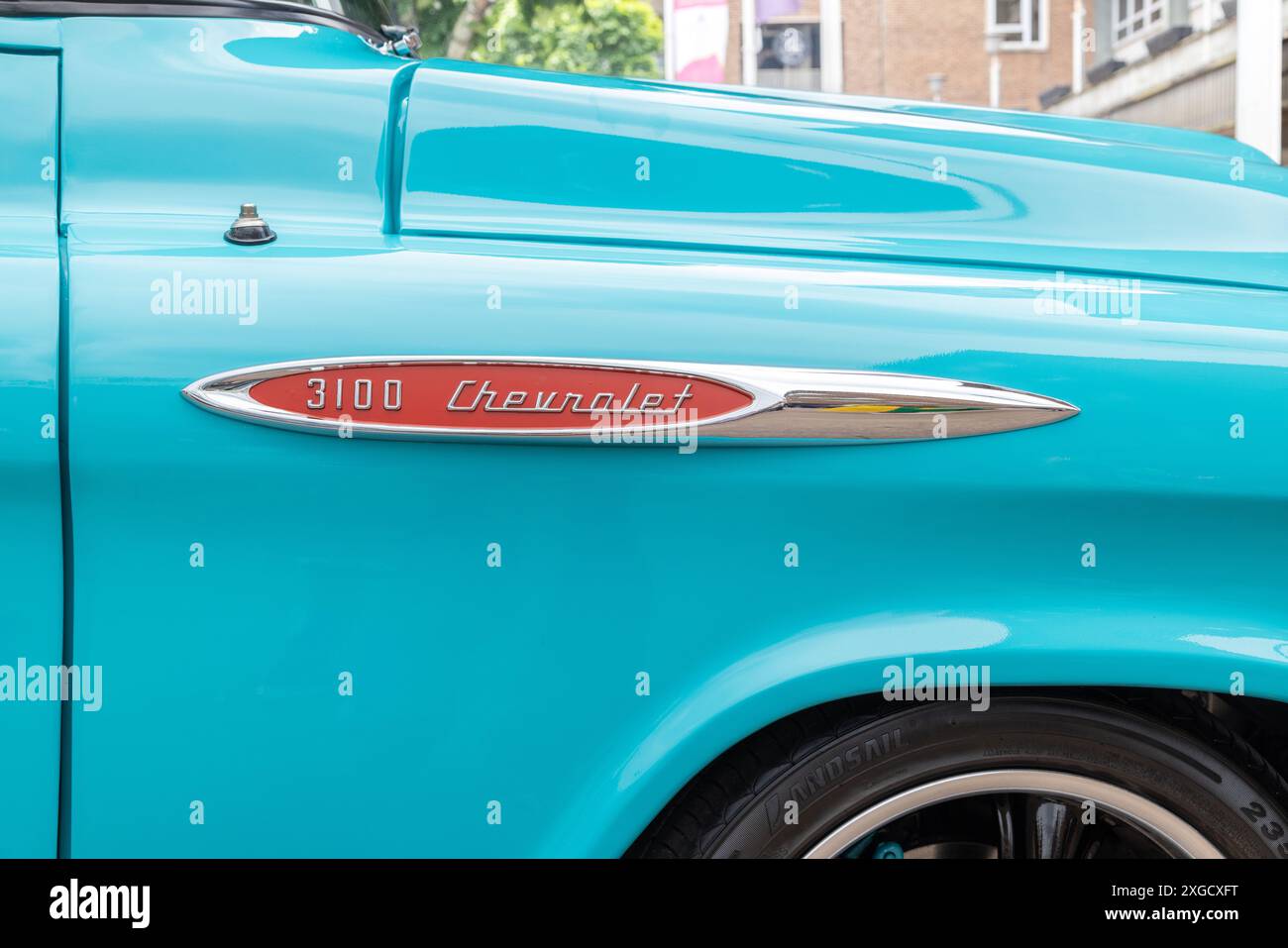 Detail of the badge attached to the front wing of a 1950s Chevrolet ...