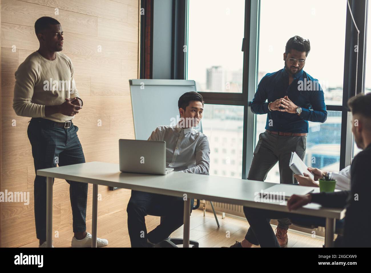 Multiethnic corporate business team reporting the Head of department ...