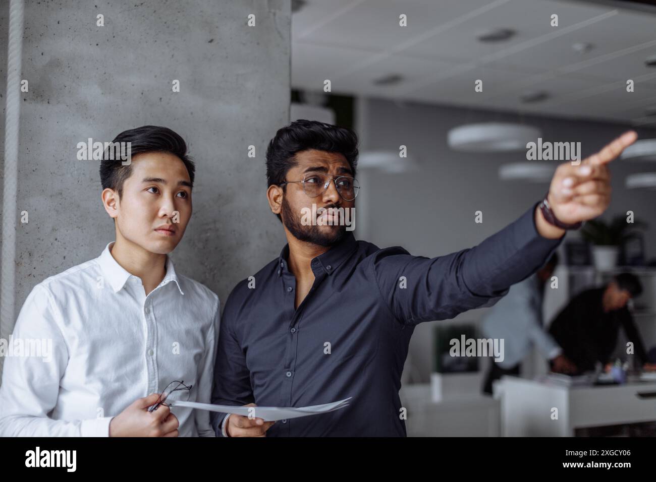 Two serious business multinational partners hi-res stock photography ...