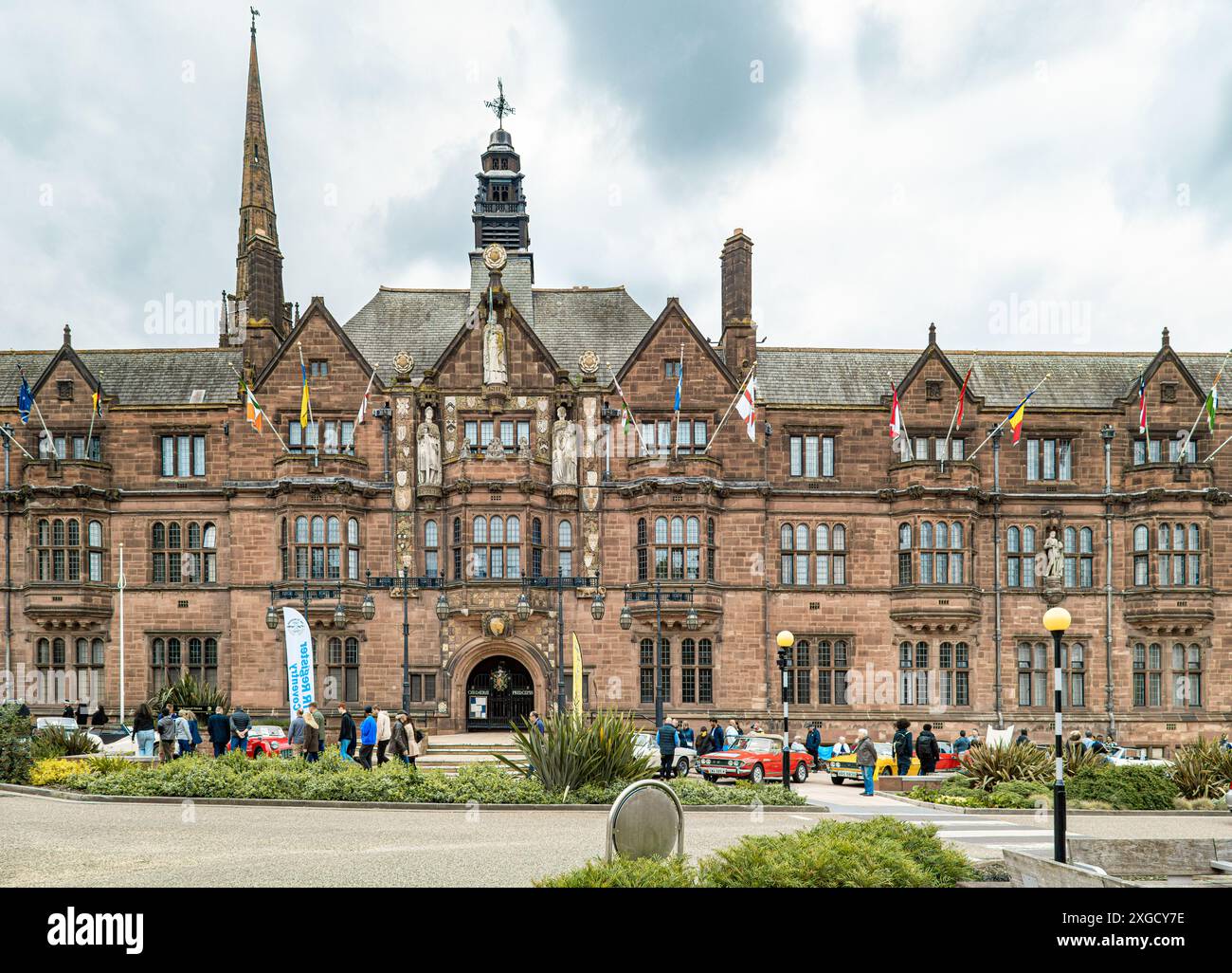 Front view of Coventry Town Hall and Council House. Classic cars parked ...
