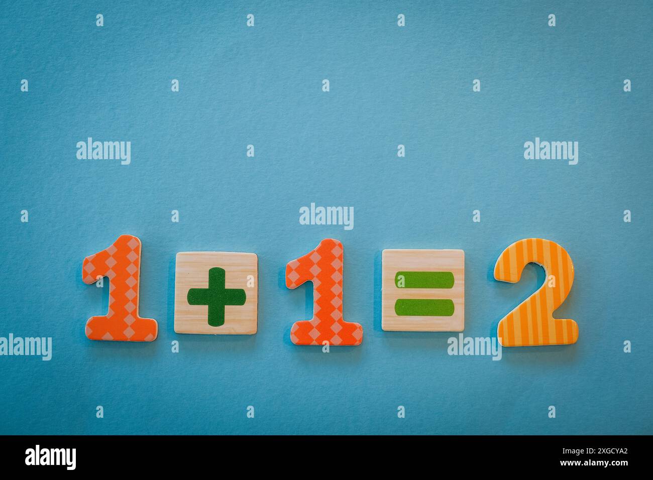 Arithmetic in colorful tiles for education Stock Photo - Alamy