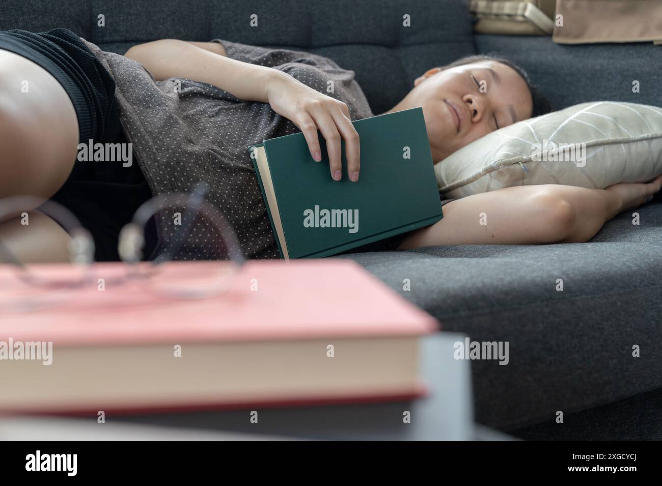 Woman fell asleep table hi-res stock photography and images - Alamy