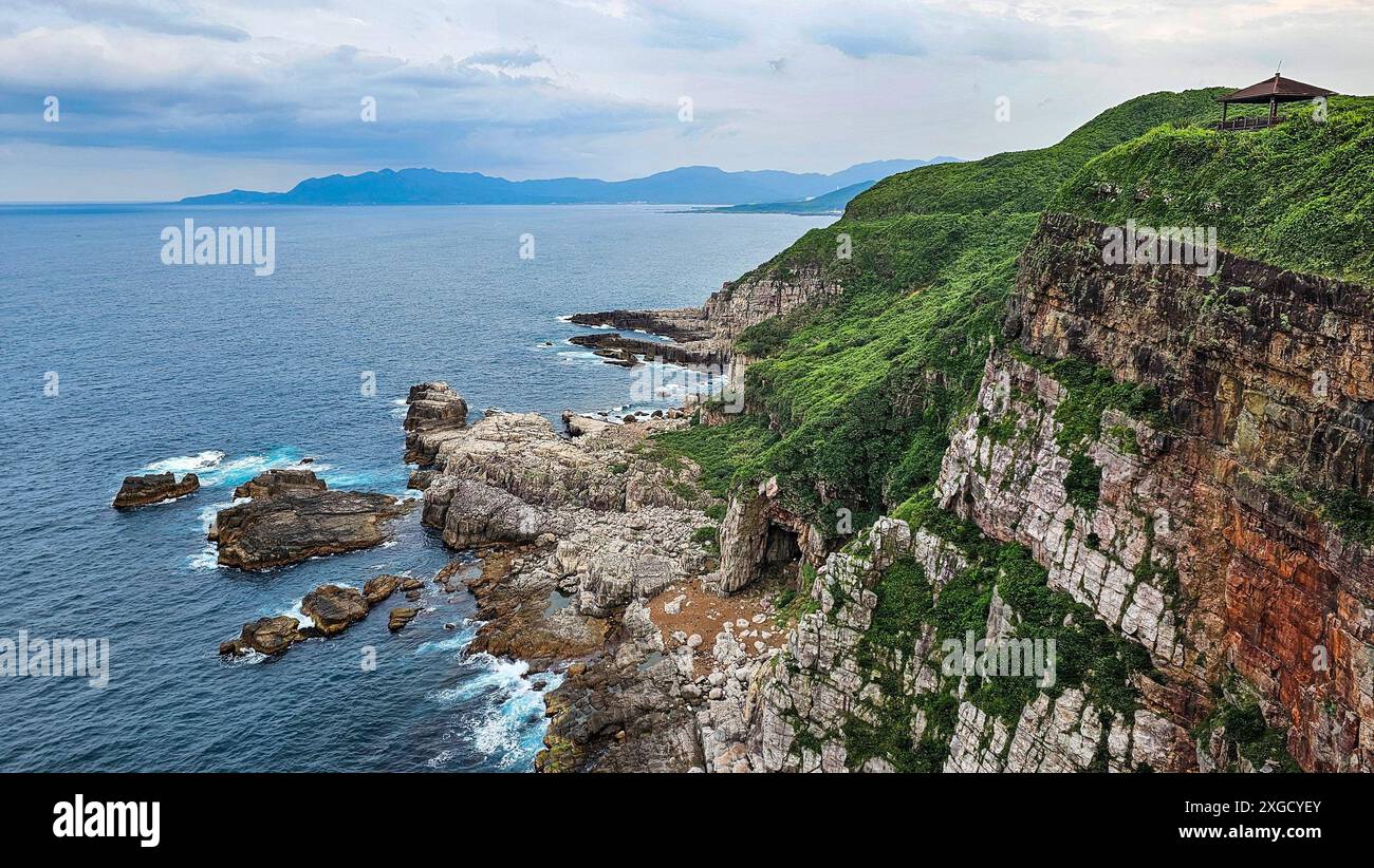 A scenic coastal view of Longdong Bay Cape Trail in Gongliao District ...