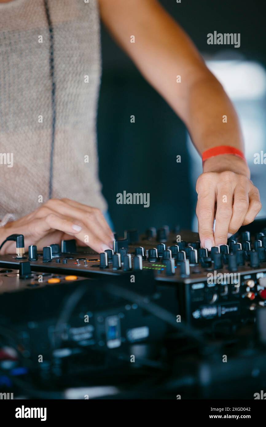 Hands dj in booth hi-res stock photography and images - Alamy