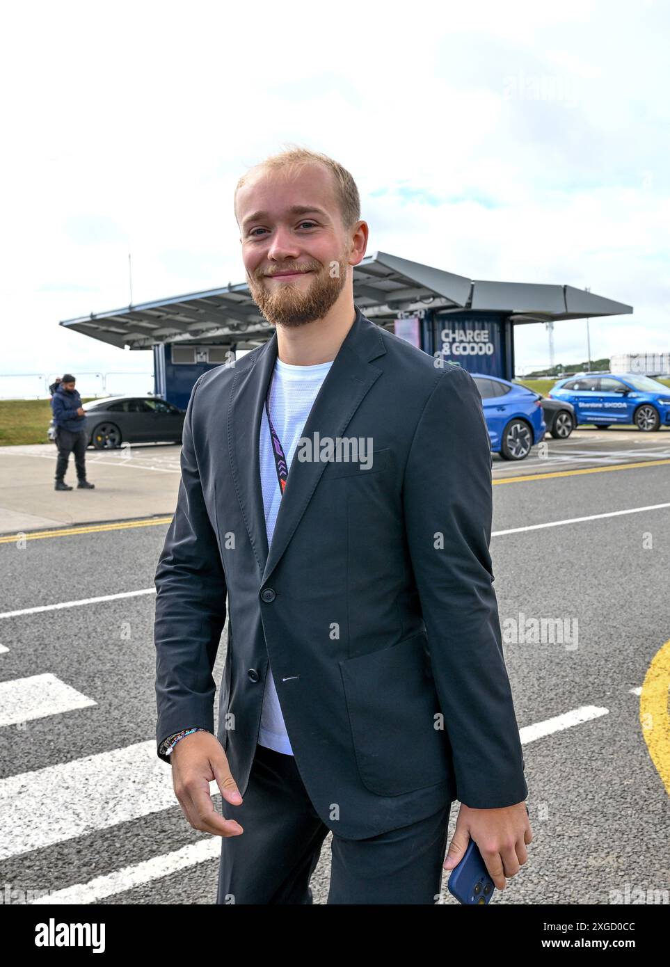 Towcester, UK. 07th July, 2024. Billy Monger arrives into the Paddock ...