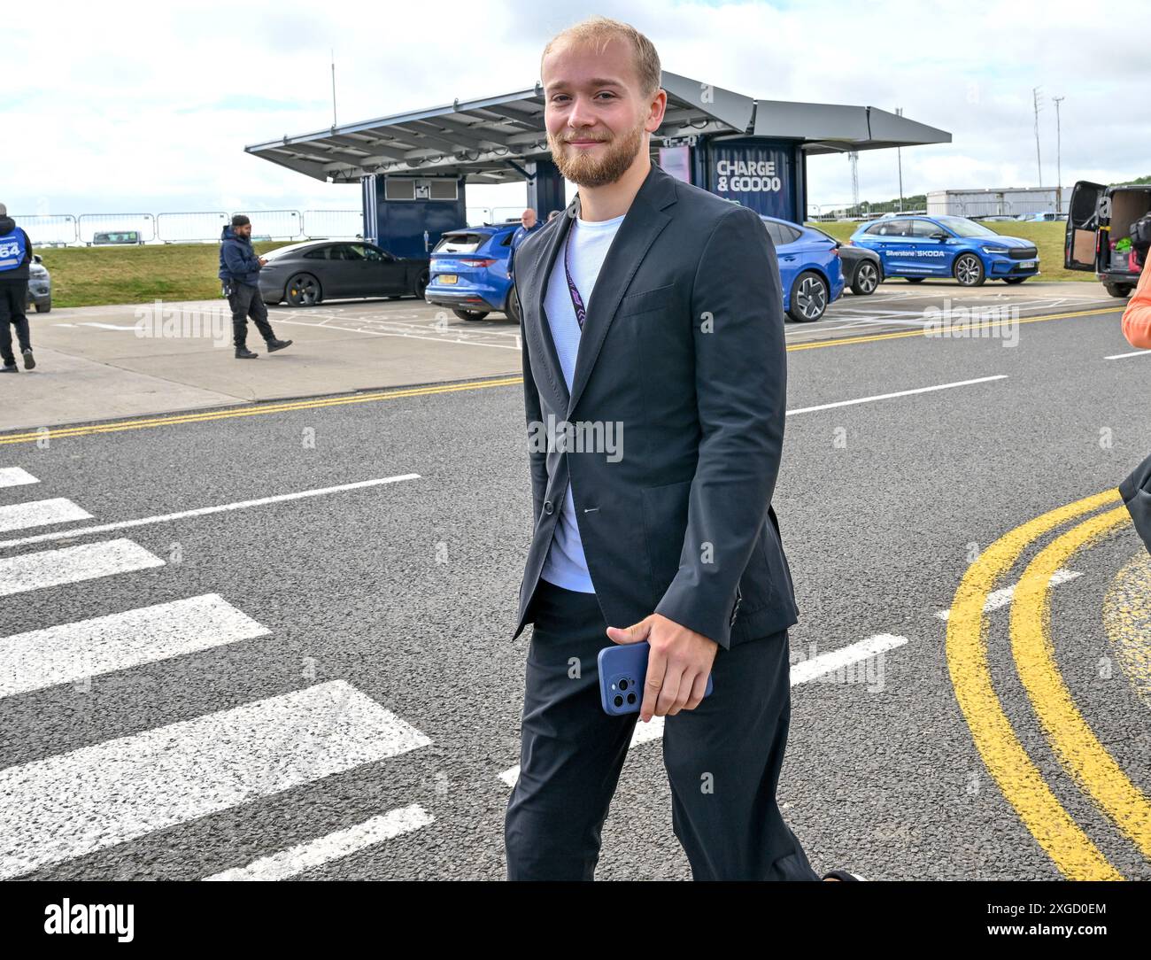 Towcester, UK. 07th July, 2024. Billy Monger arrives into the Paddock ...