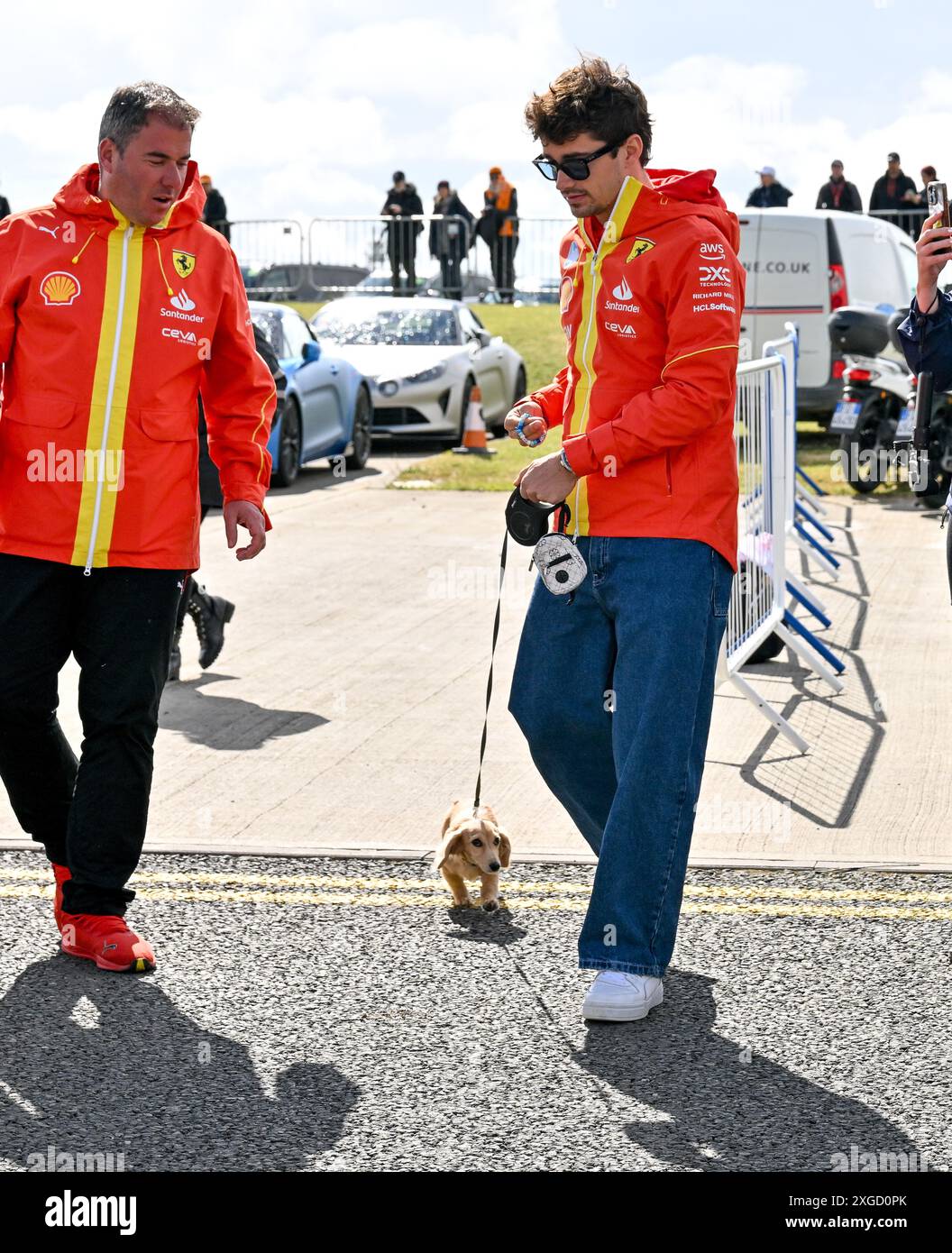 Towcester, UK. 07th July, 2024. Charles Leclerc with his dog Leo ...