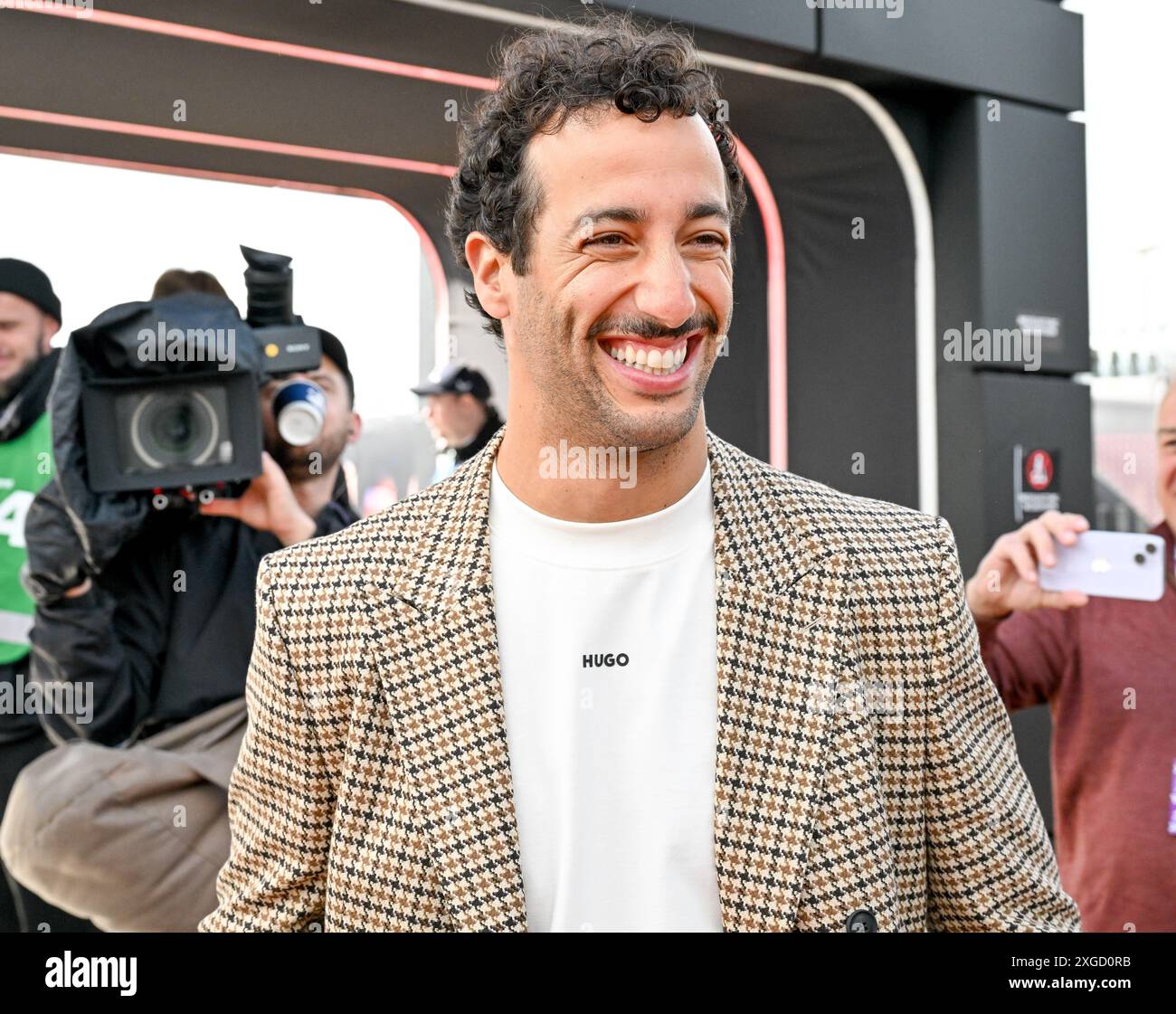 Towcester, UK. 07th July, 2024. Daniel Ricciardo arrives into the ...