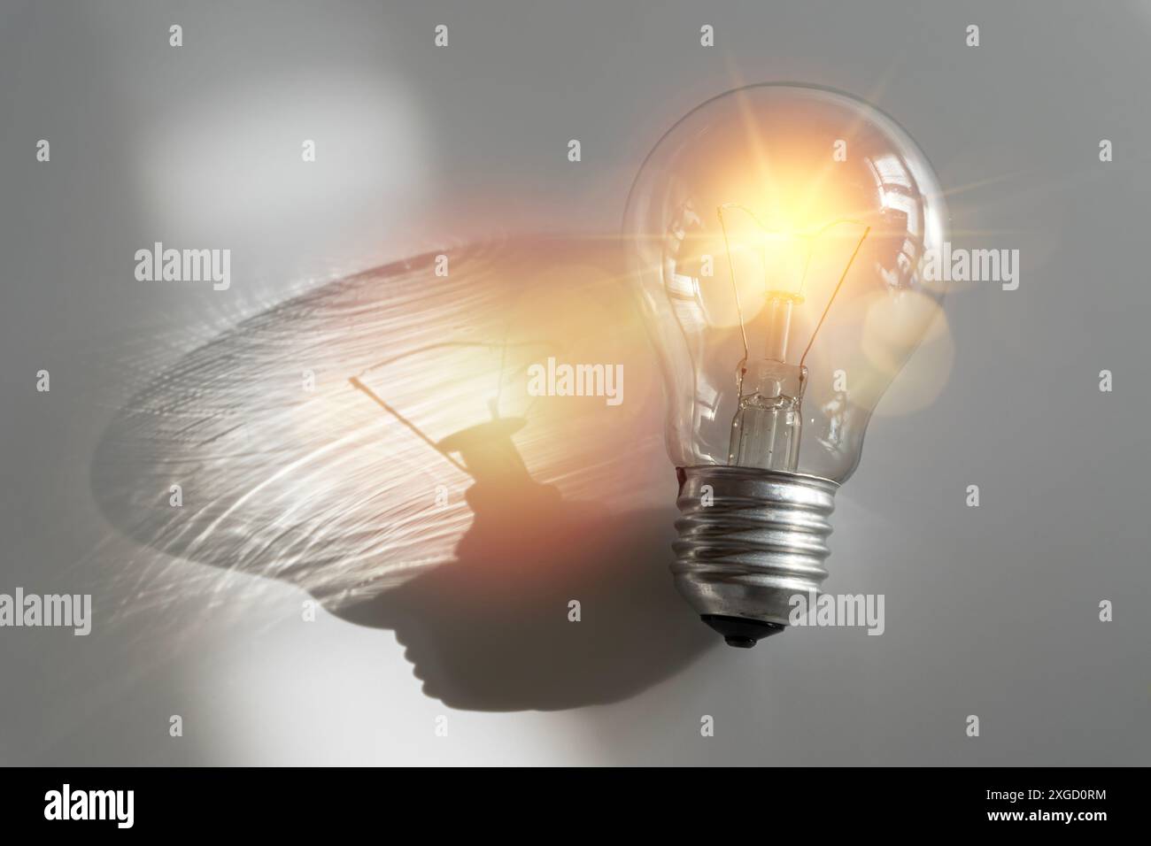 Small fluorescent light bulb. Innovation. Inspiration. Modern ...