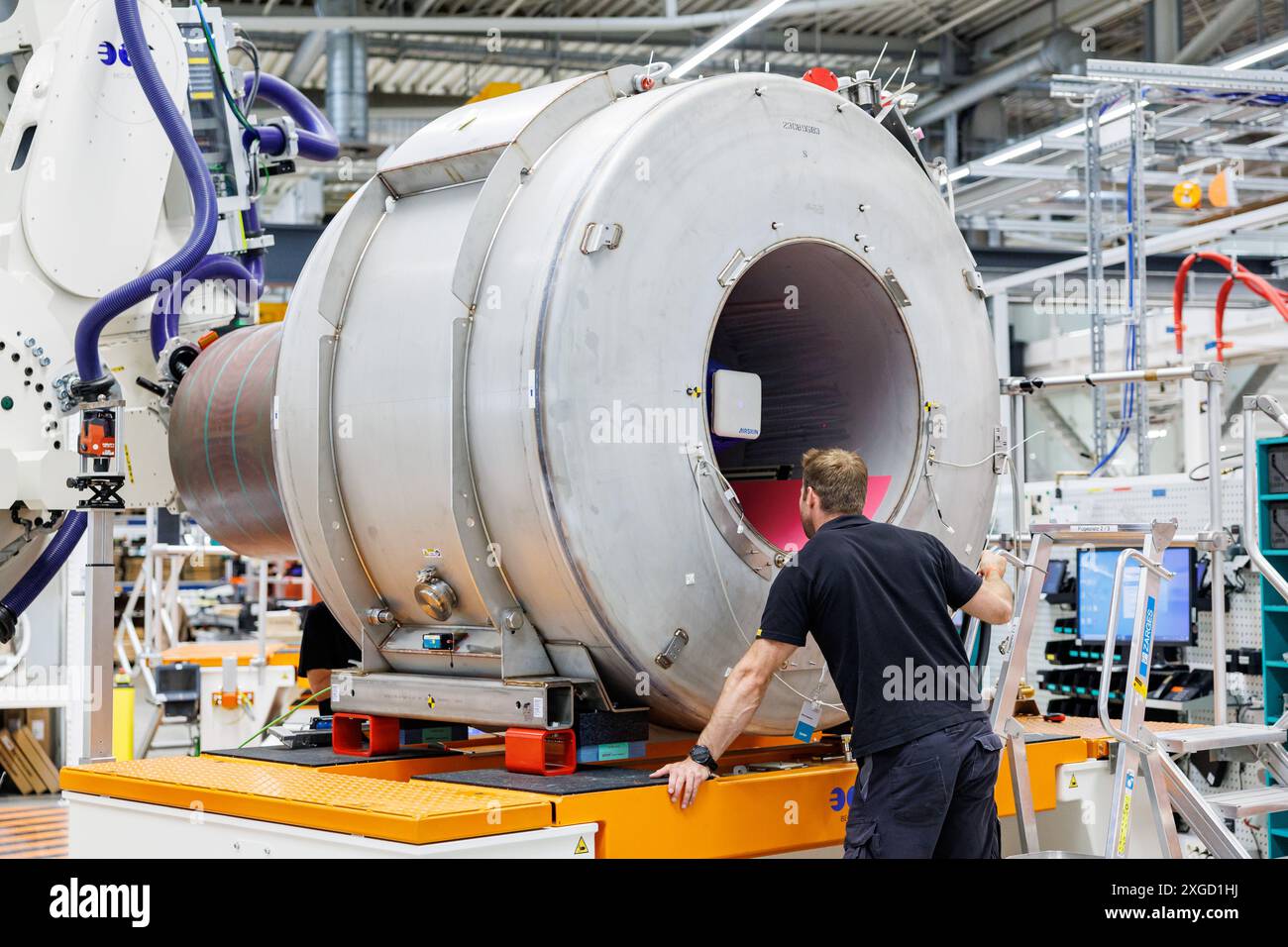Erlangen, Germany. 08th July, 2024. An employee of Siemens Healthineers ...