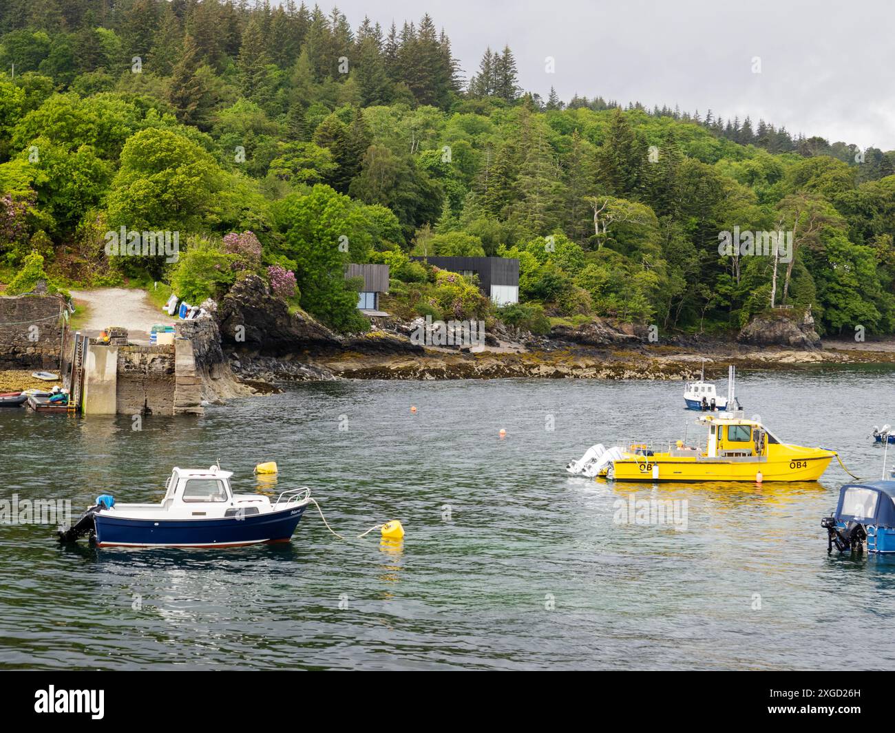 Modern houses on the coast at Armadale on the Isle of Skye, Scotland ...