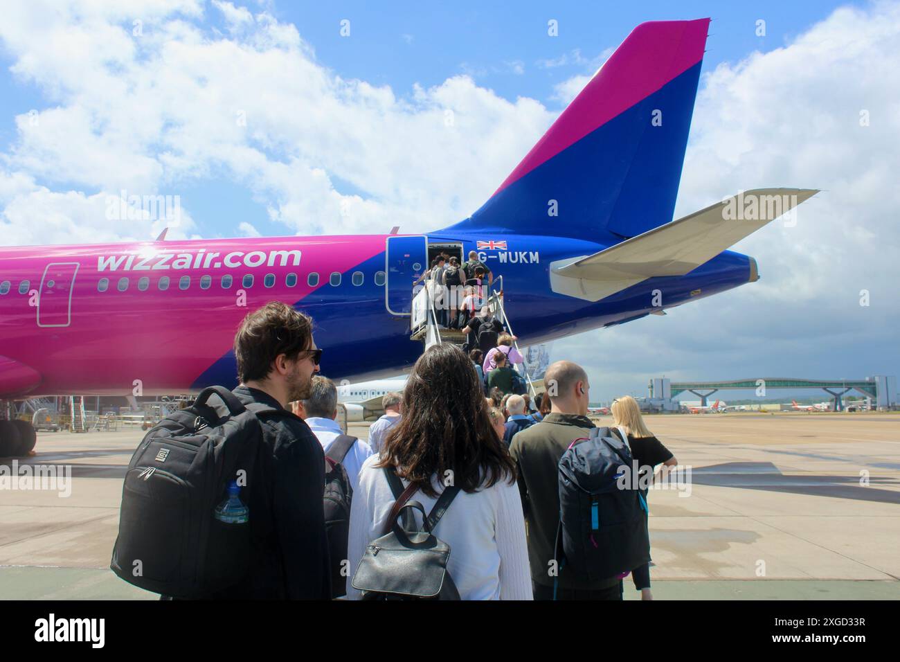 Gatwick airport- passengers boarding a whizz air flight via movable ...