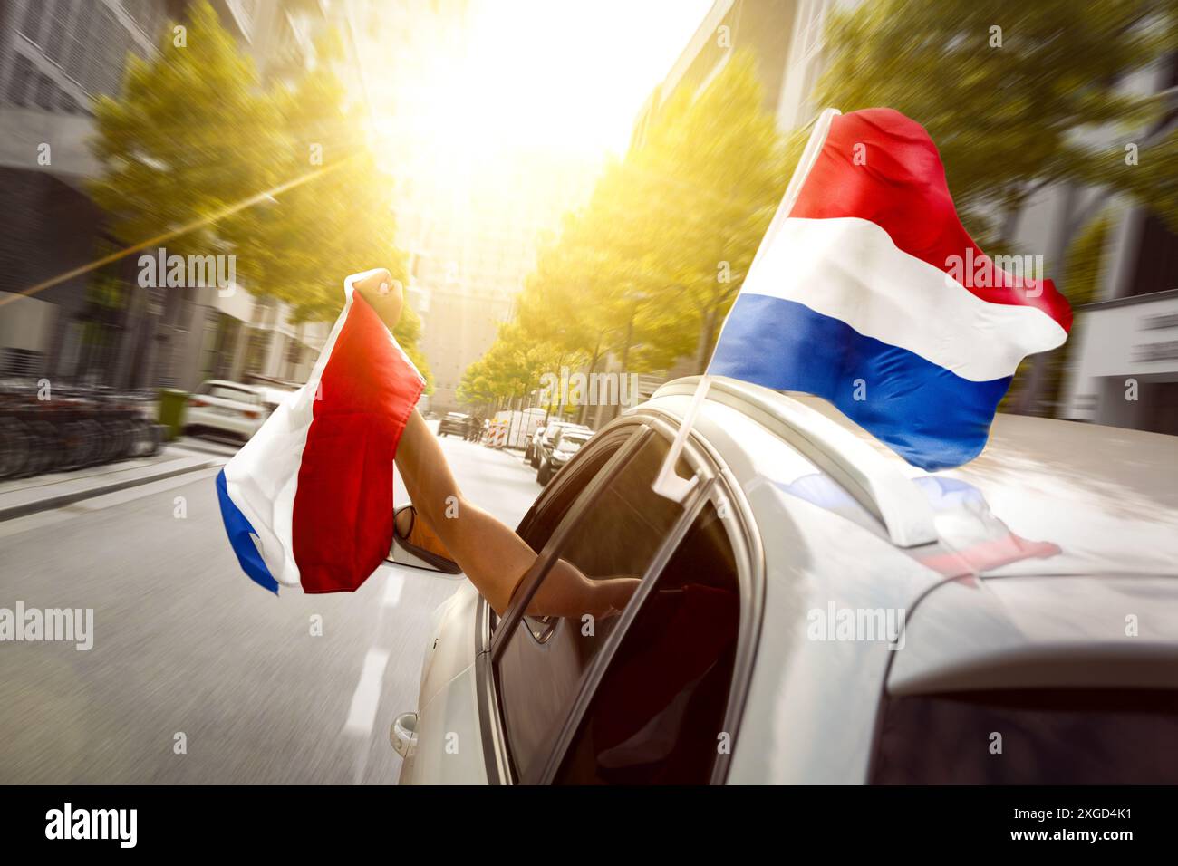 Fans with Dutch Flag Celebrating in a Car Stock Photo - Alamy