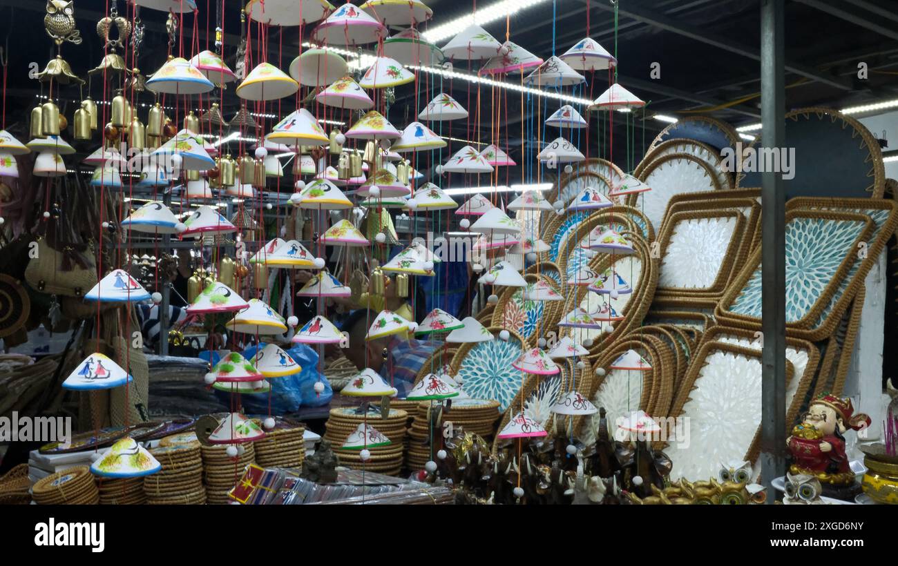 wind chimes are designed as conical hats are on sale in gift shop ...