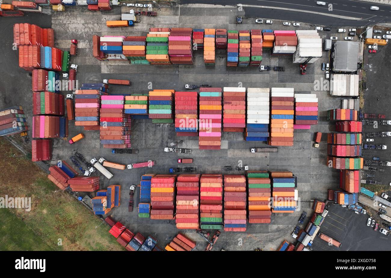 Container stacking at freight and logistic area, Ariel view Stock Photo ...