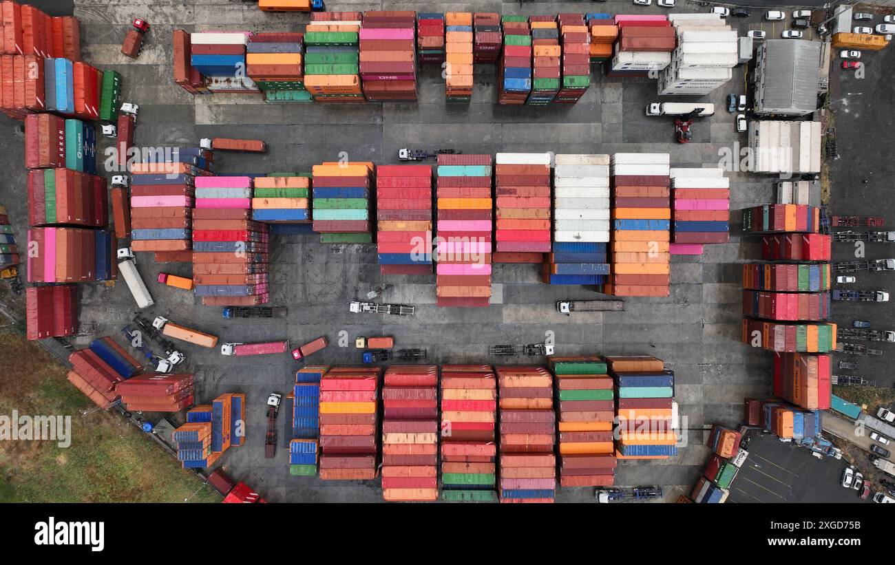 Container stacking at freight and logistic area, Ariel view Stock Photo ...
