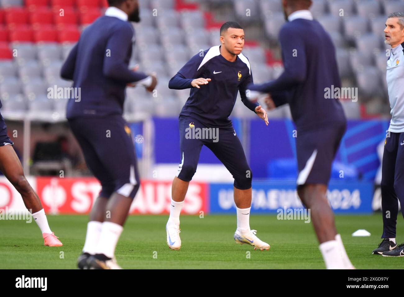 France's Kylian Mbappe (centre) during a training session at the Munich ...
