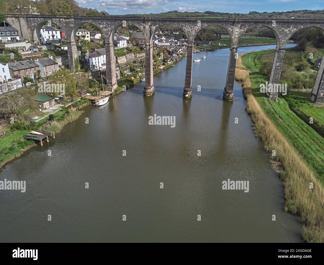 A view of the River Tamar at Calstock, with a railway viaduct crossing ...
