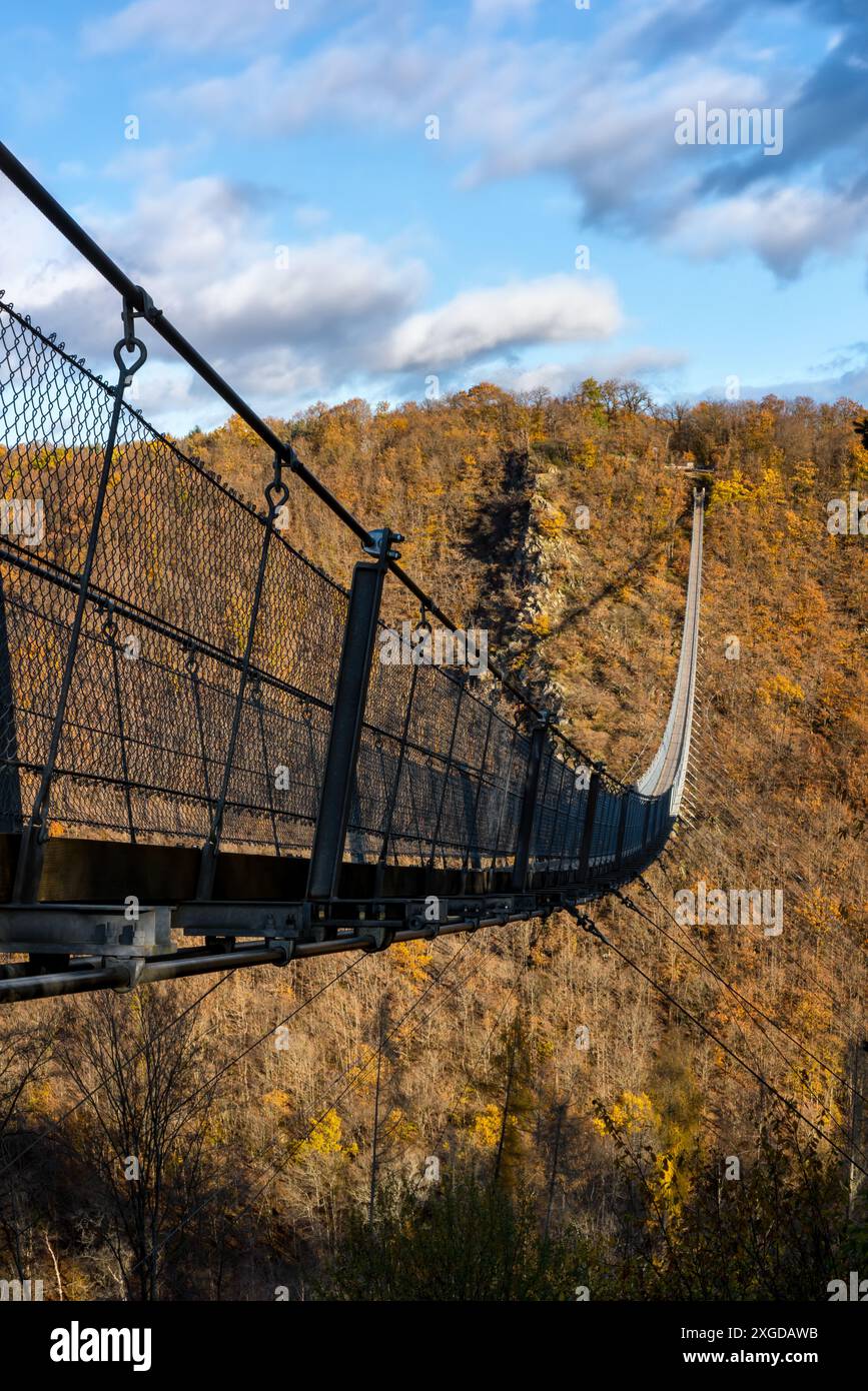 Geierlay suspension bridge in an autumn landscape with trees, Rhineland ...